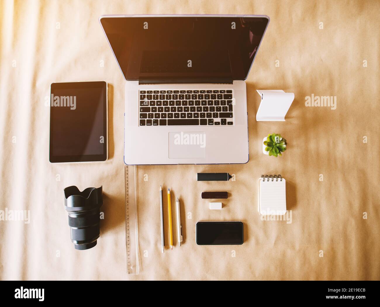 Top view of modern business and photographers workspace set up on the ...