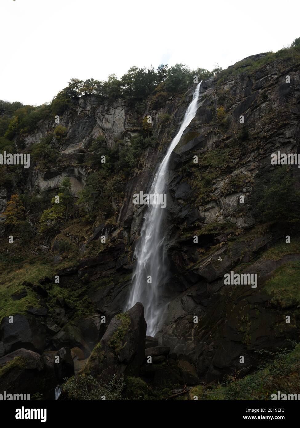 Panoramic view of Foroglio waterfall river cliff swiss alps mountains ...