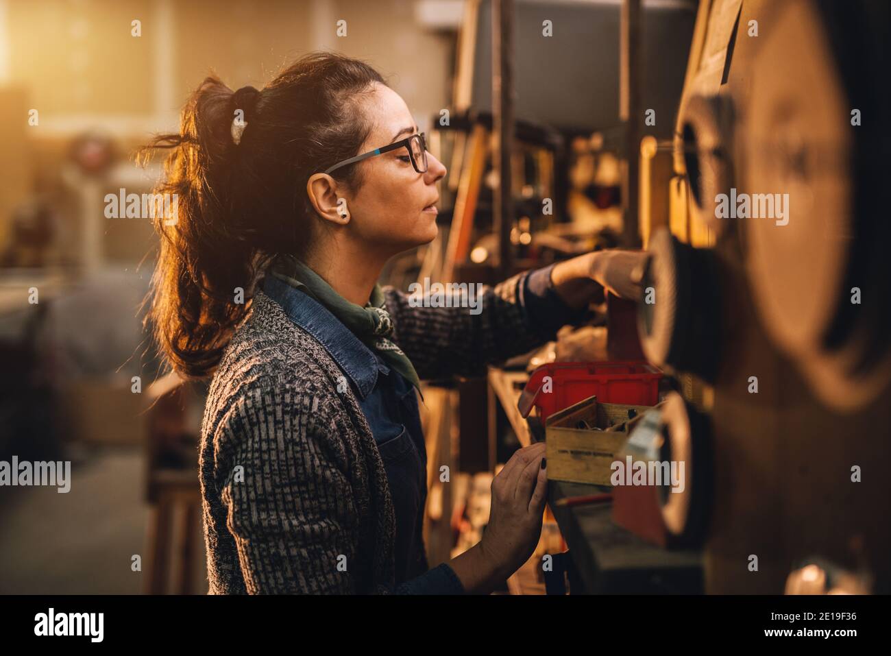 Portrait side view of happy attractive hardworking middle aged ...