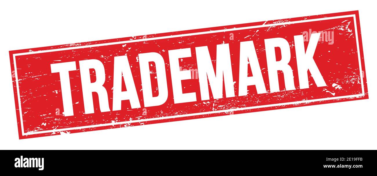 TRADEMARK text on red grungy rectangle stamp sign Stock Photo - Alamy