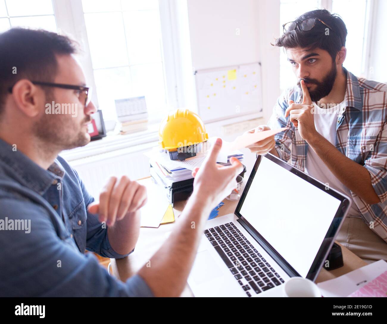 Sneaky office hi-res stock photography and images - Alamy