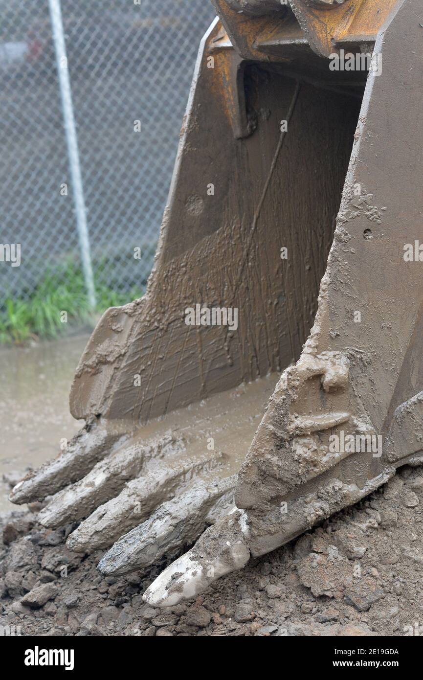 Close-up view of excavator bucket in mud Stock Photo - Alamy
