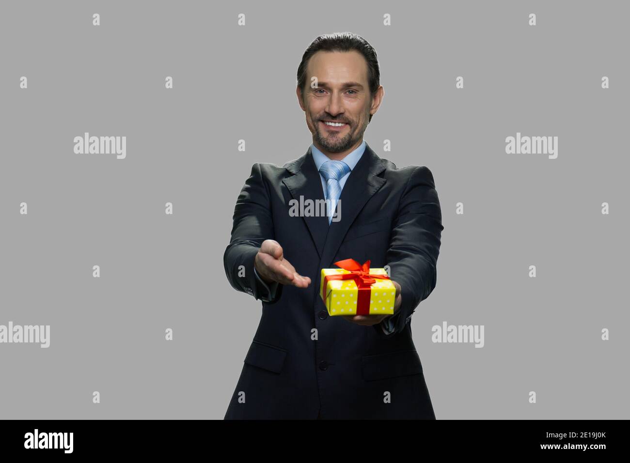 Attractive businessman offering hand hi-res stock photography and ...