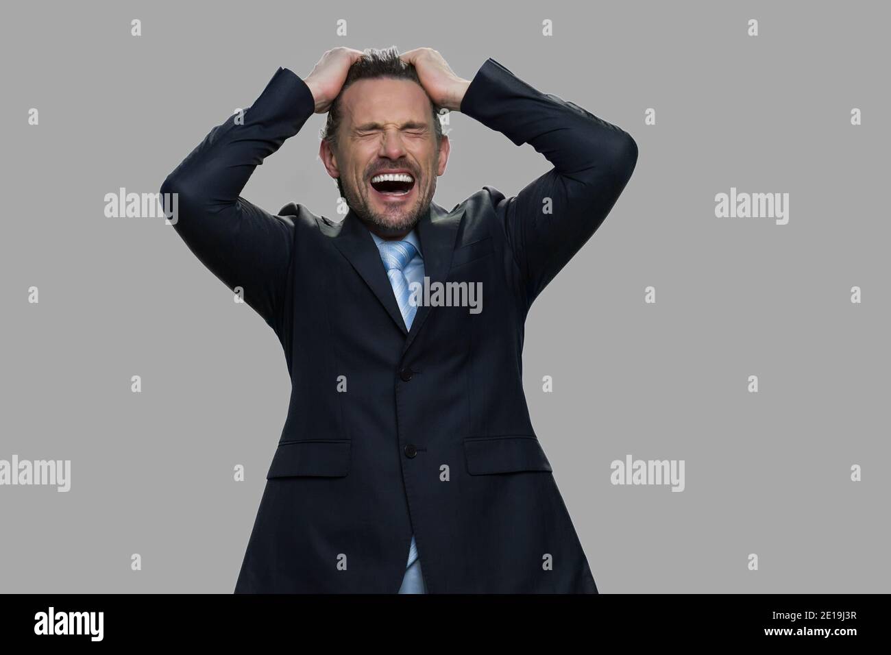 Portrait confused businessman screaming hi-res stock photography and ...