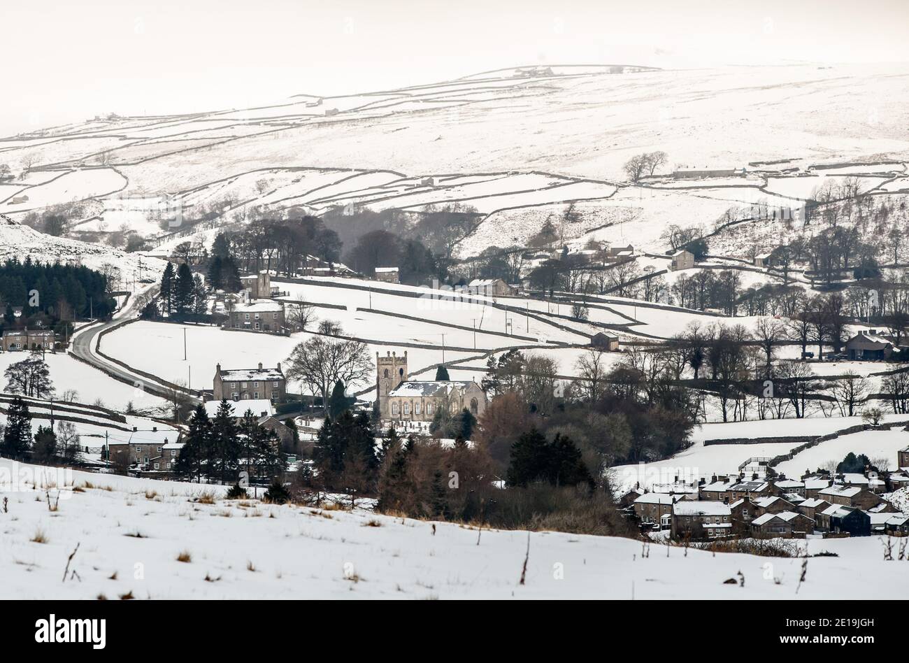 Snow covers the village of Langthwaite in North Yorkshire Stock Photo ...