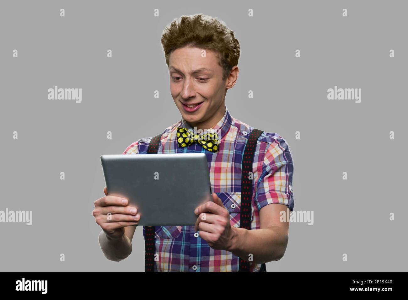 Attractive teen boy having video call Stock Photo - Alamy
