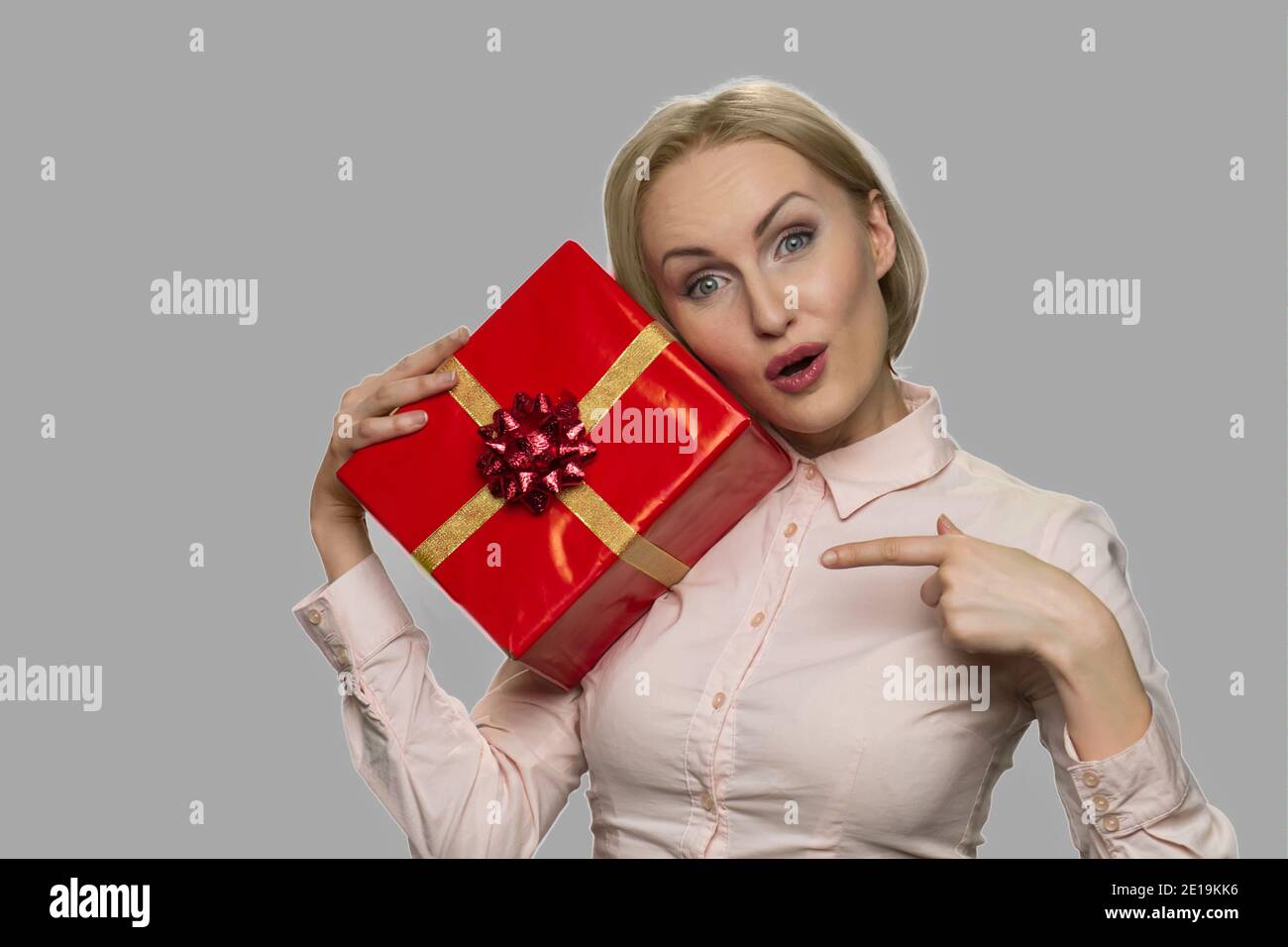 Pointing at gift hi-res stock photography and images - Alamy