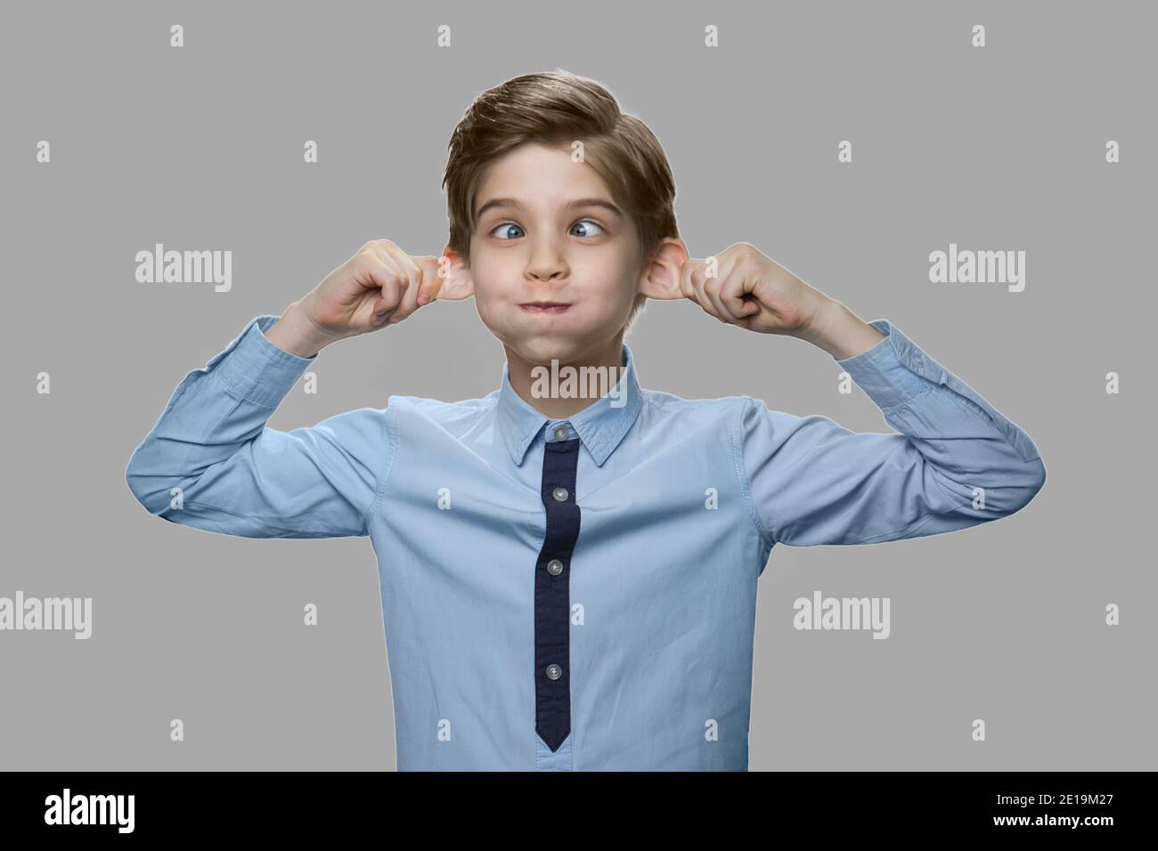 Young boy making monkey face hi-res stock photography and images - Alamy
