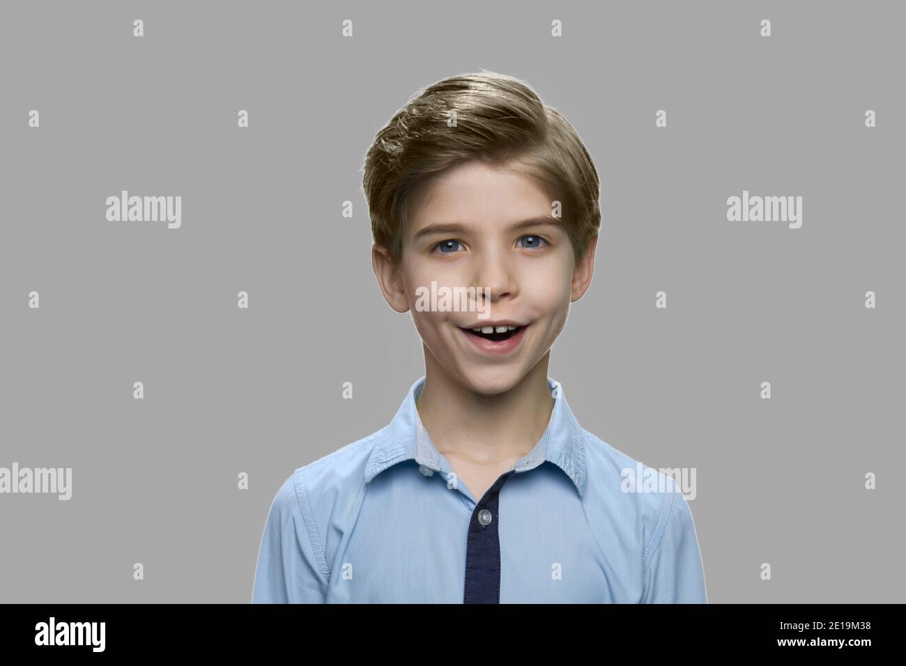 Close up handsome child on gray background Stock Photo - Alamy