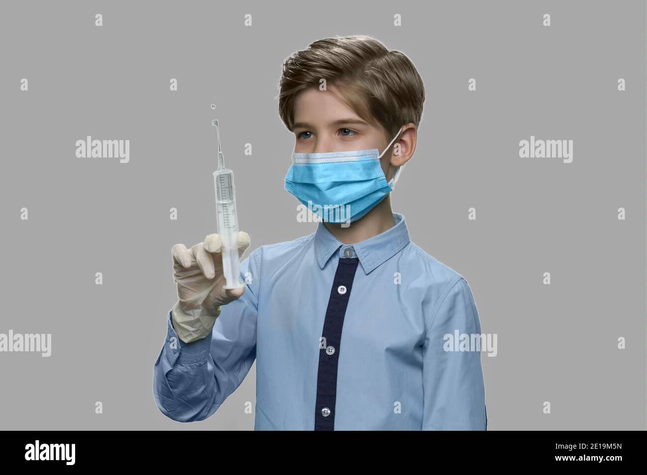 Child boy preparing syringe for injection Stock Photo - Alamy