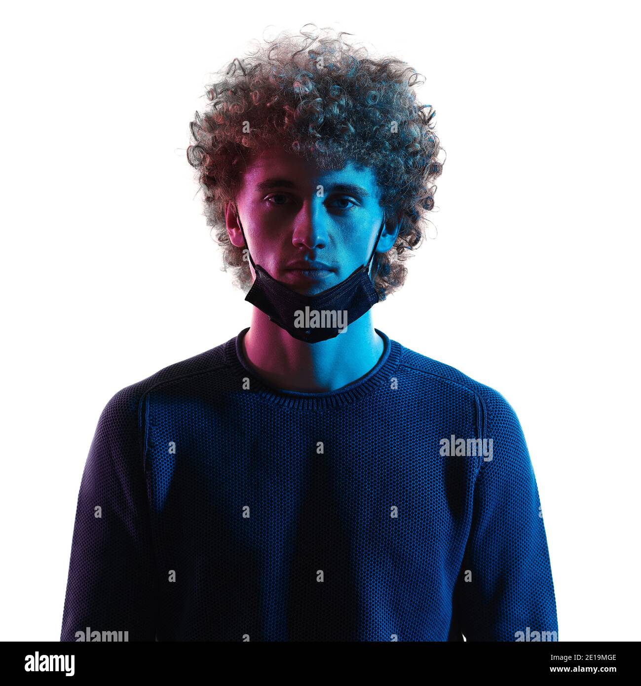 one caucasian young man headshot face portrait wearing a mask unmasked ...