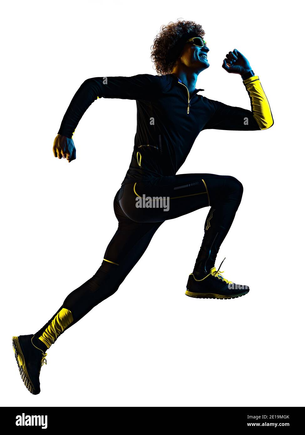 one youg caucasian runner jogger running jogging man in studio shadow ...