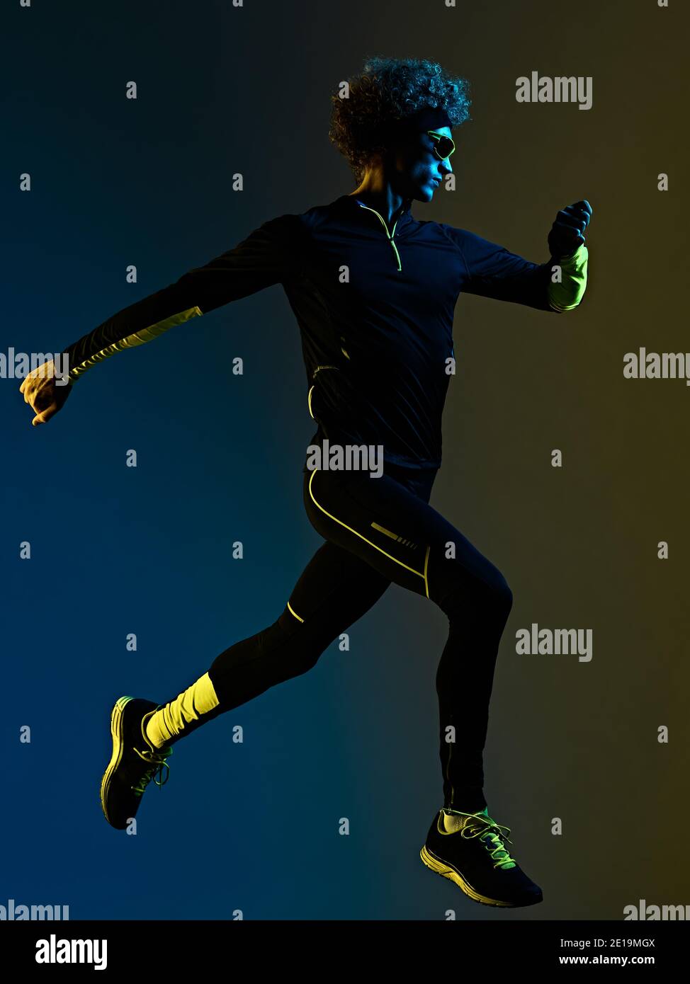 one youg caucasian runner jogger running jogging man using smartwatch ...