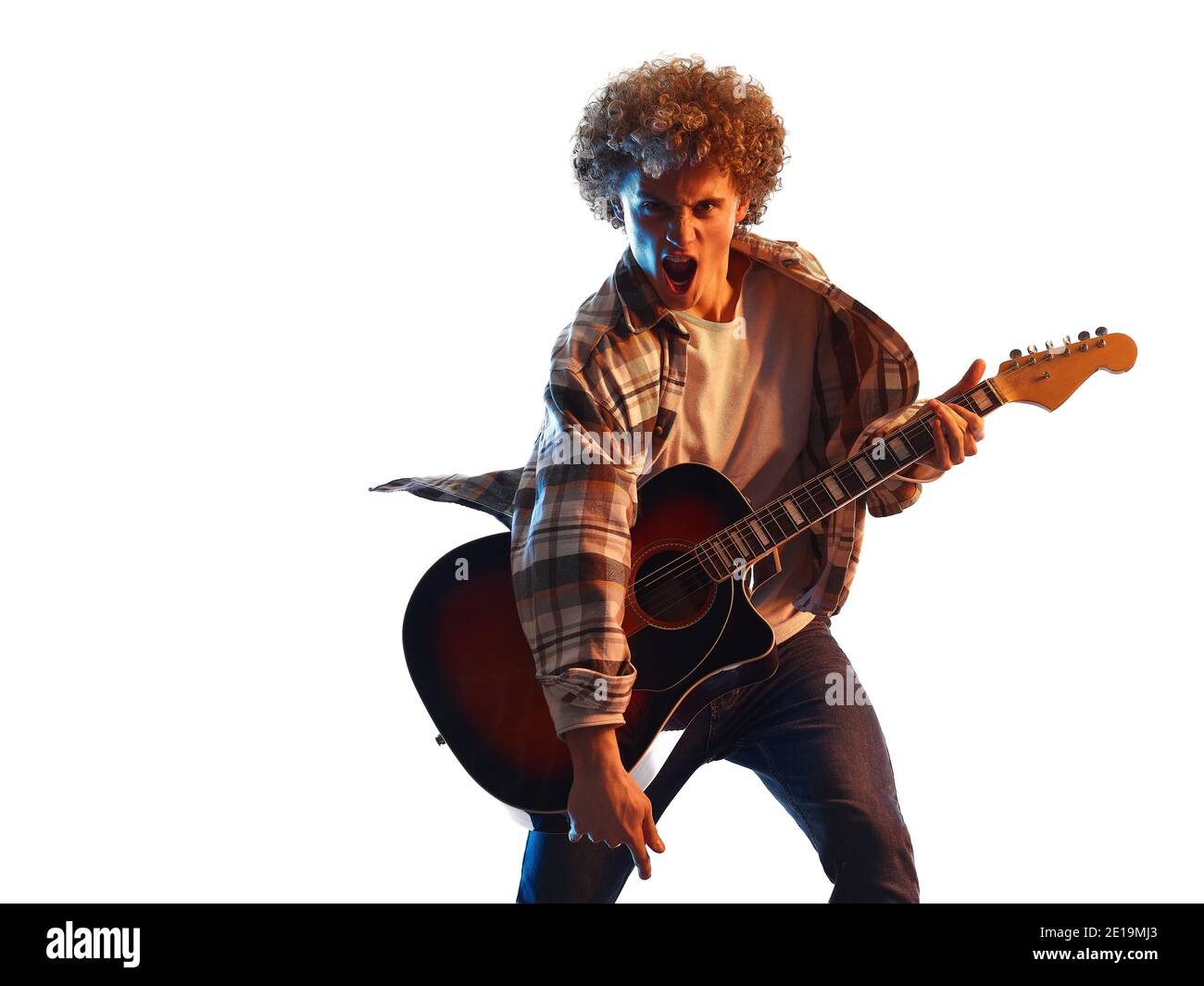 one young caucasian man guitar player in studio shadow silhouette ...