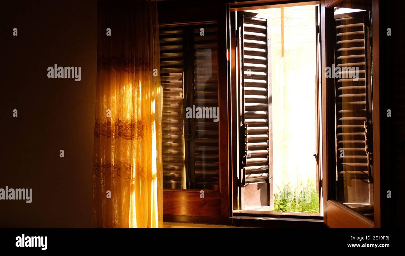 Early in the morning, sunlight create beautiful effects through the ...