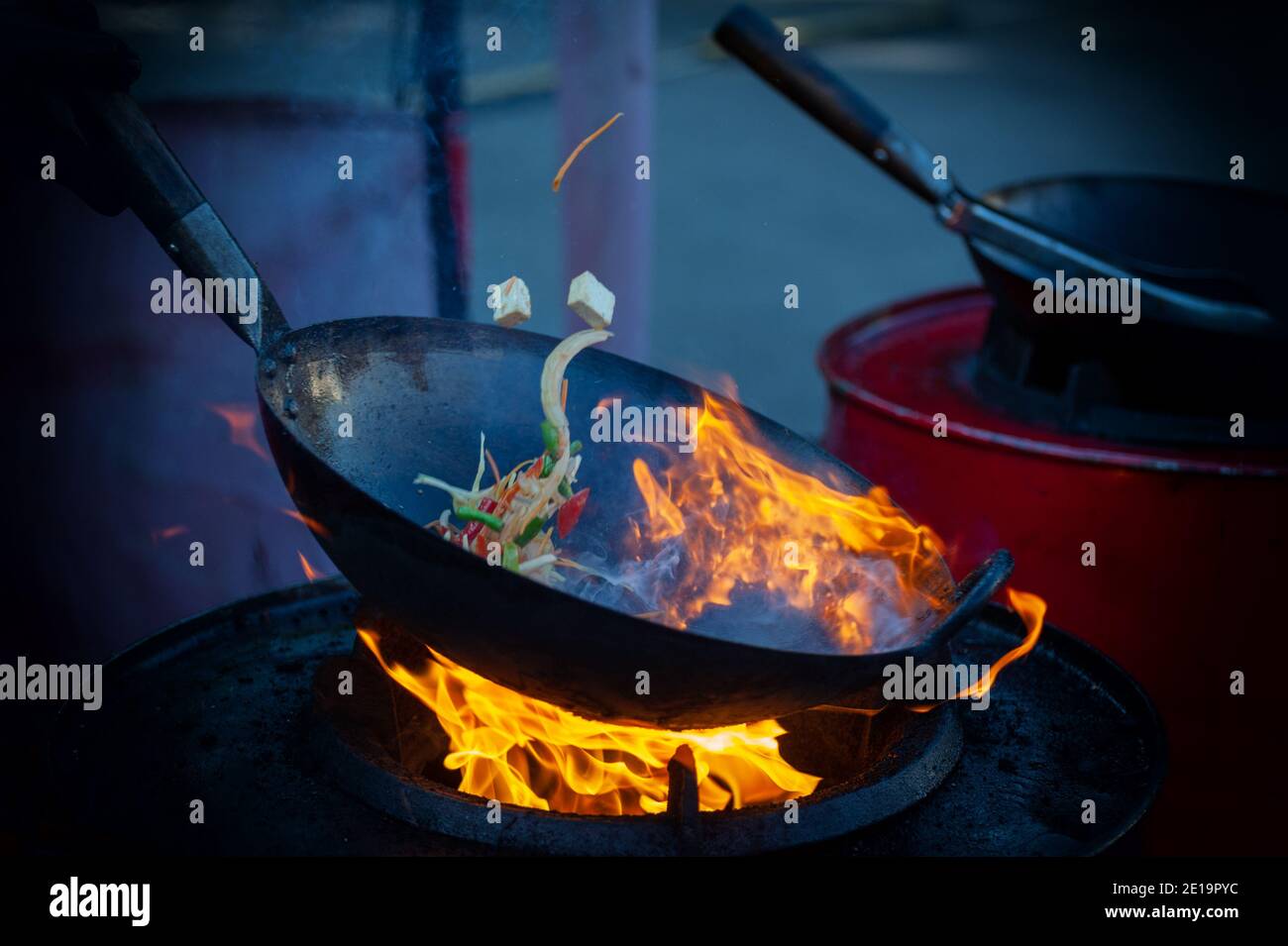 Cooking on gas stove street hi-res stock photography and images - Alamy