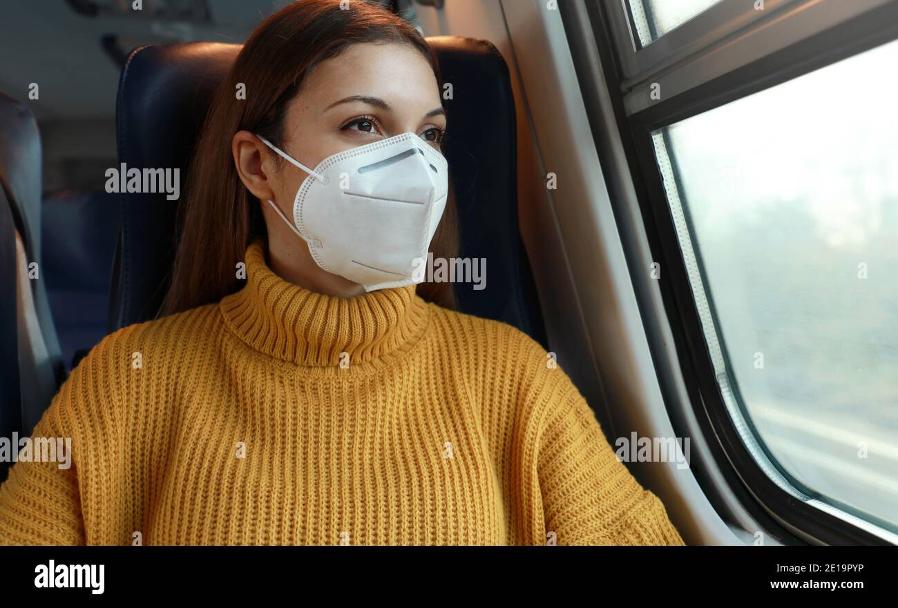Travel safely on public transport. Young business woman with KN95 FFP2 ...