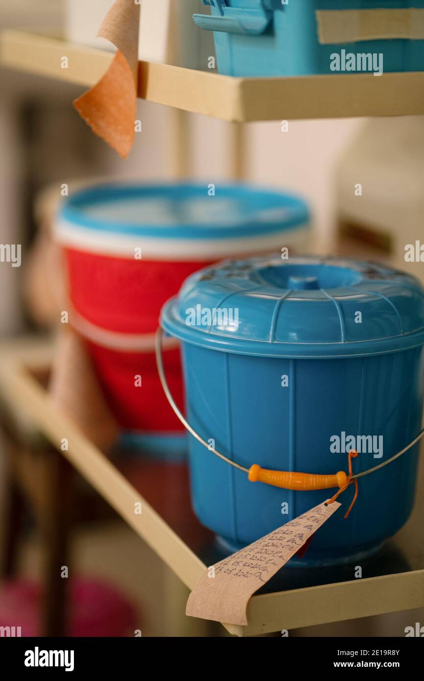 Plastic medical jars with tags. Tankers for used medical devices and ...