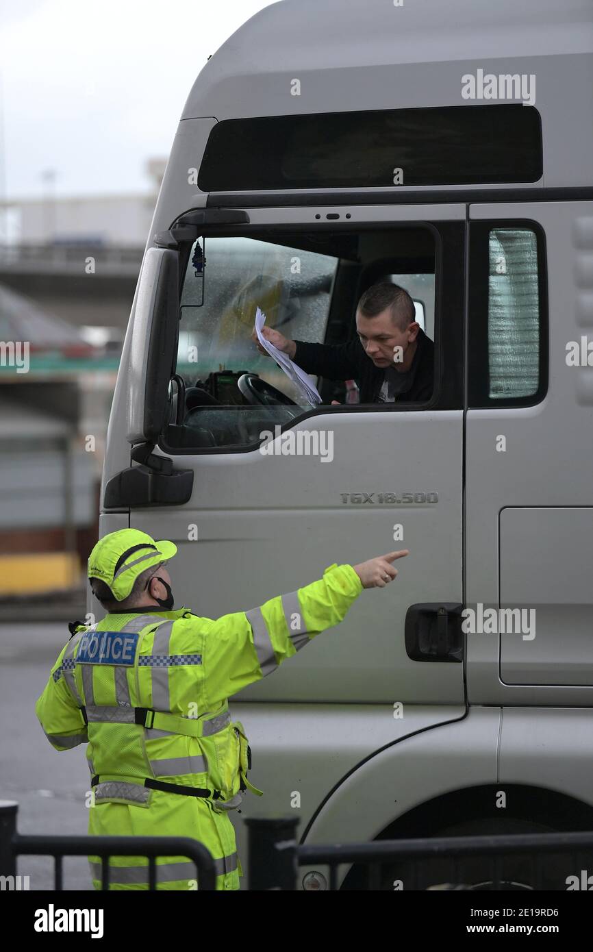 Police at the Port of Dover in Kent UK check drivers paperwork ...