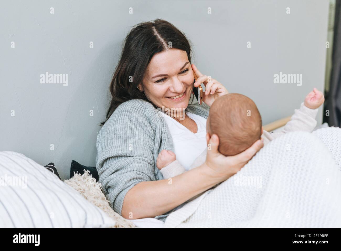 Mother speaking newborn hi-res stock photography and images - Alamy