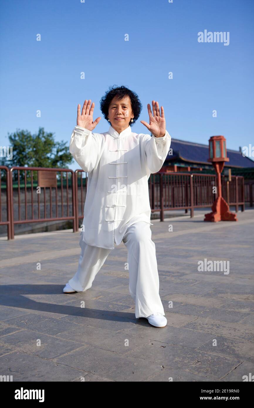 Asian family practicing tai chi hi-res stock photography and images - Alamy