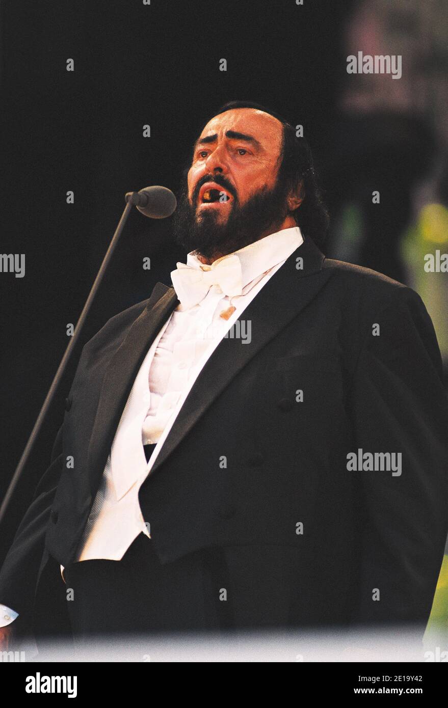 Luciano Pavarotti on stage at the Pavarotti Picnic In The Park concert ...