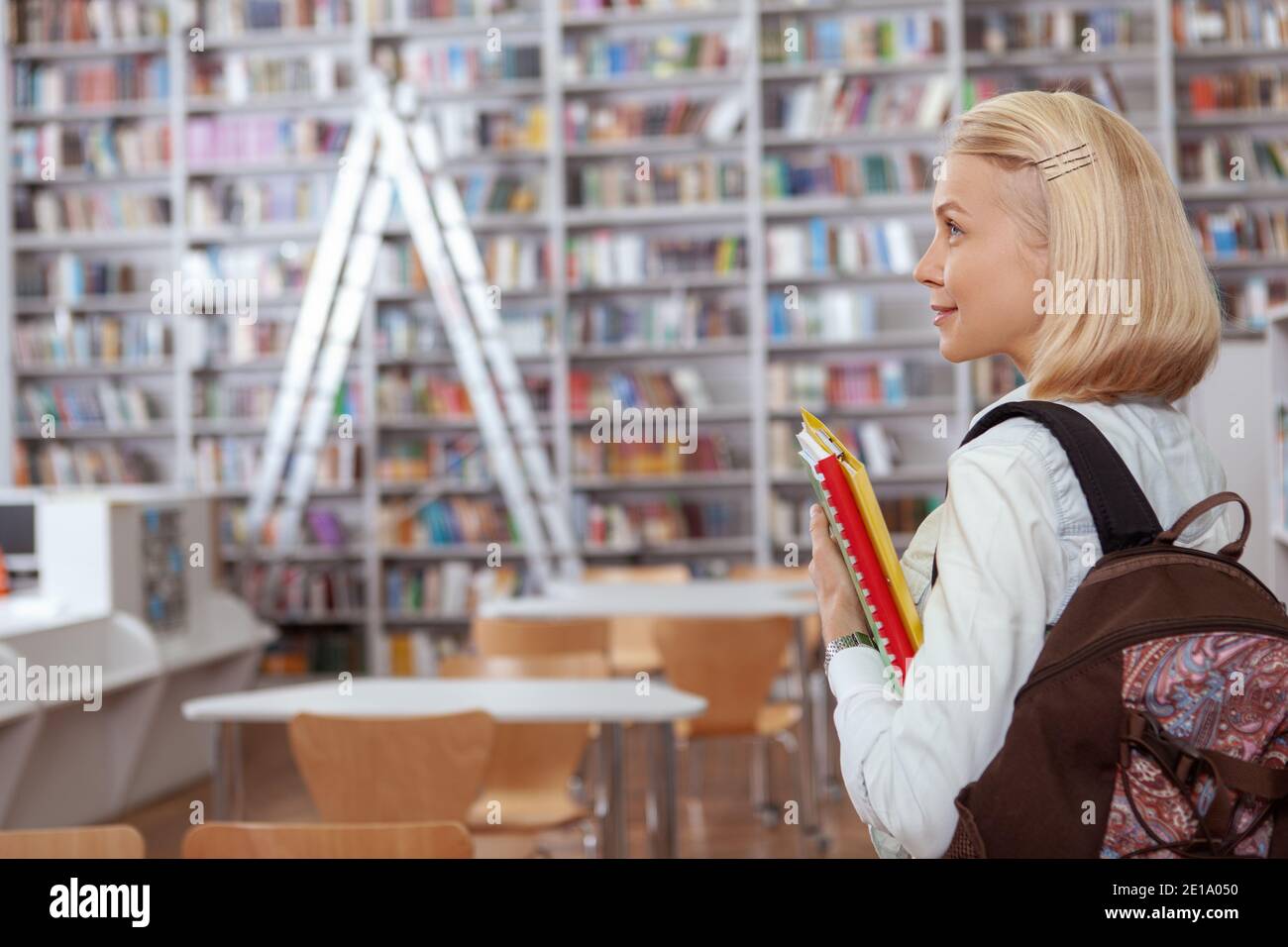 Female university student library rear hi-res stock photography and ...