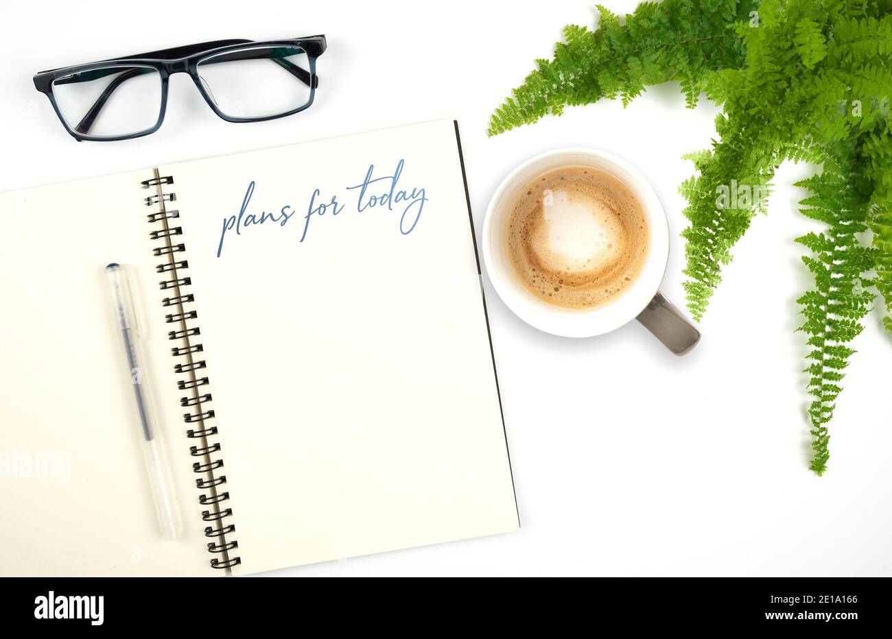 open spiral notebook with handwritten text PLANS FOR TODAY, pen and ...