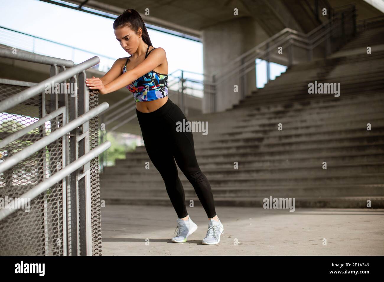 Pretty young woman exercise in hi-res stock photography and images - Alamy