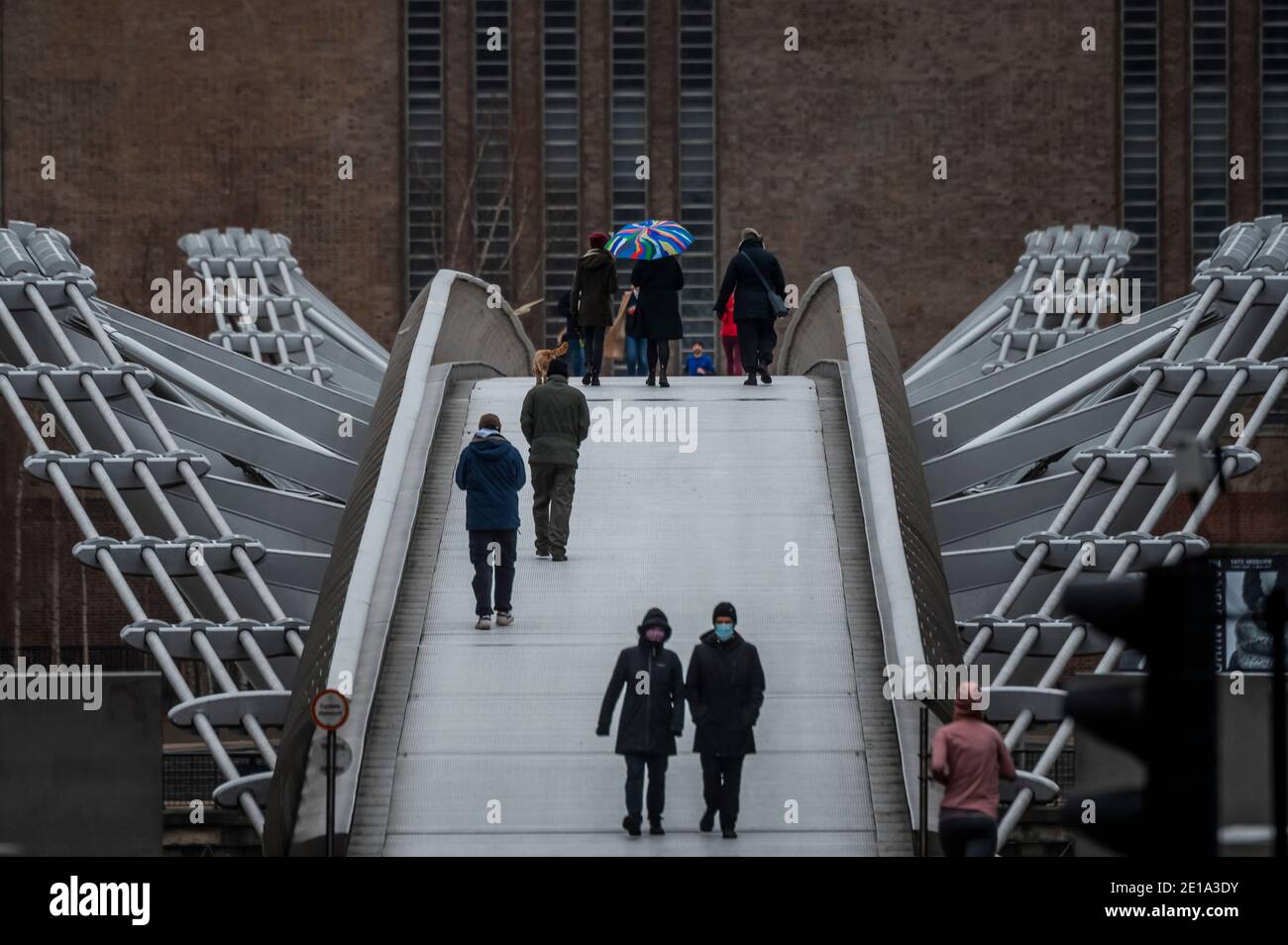 London, UK. 5th Jan, 2021. The Millennium Bridge is still failry busy ...