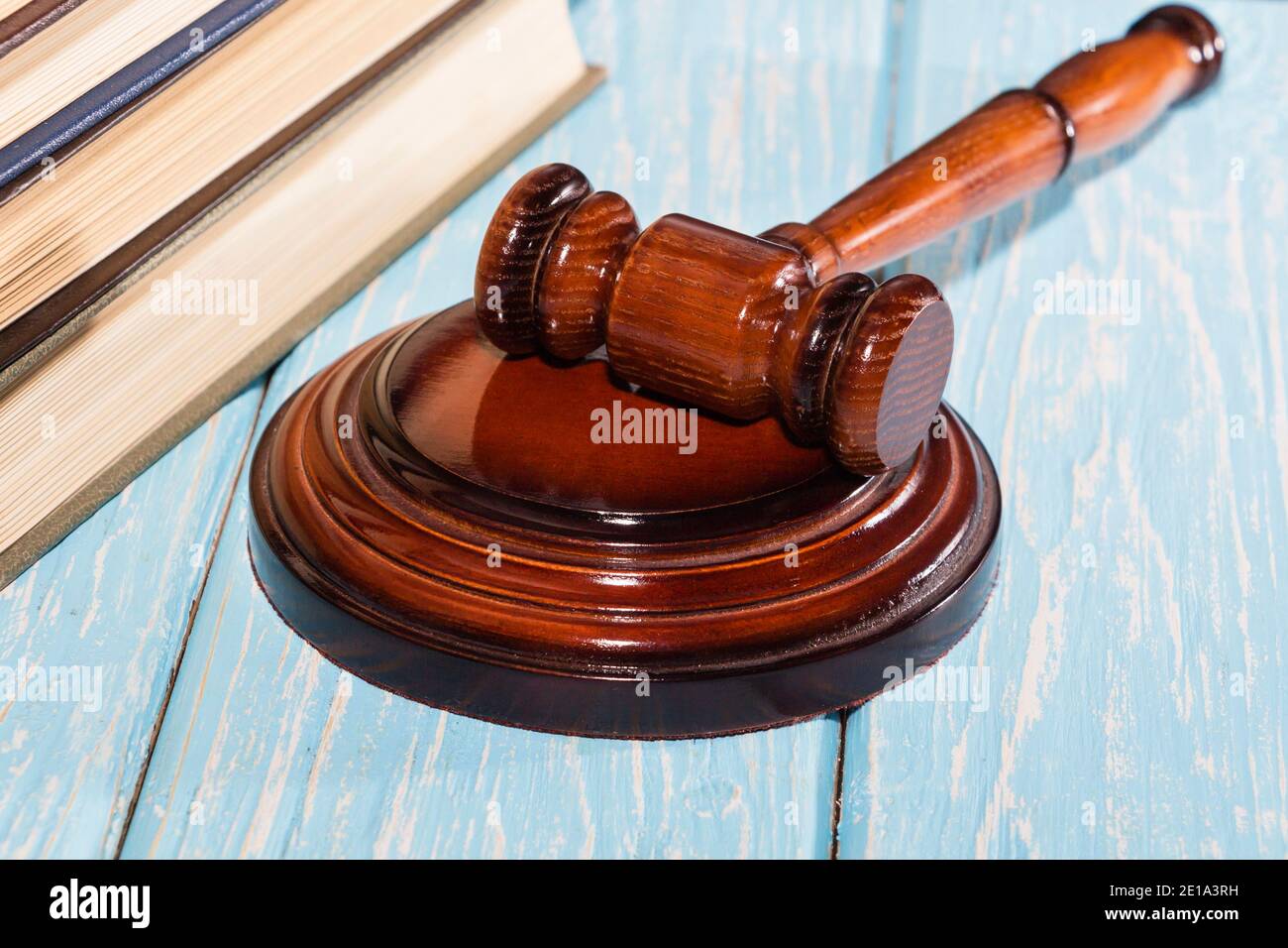 hammer judge on the background of a pile of books, the image on a light ...