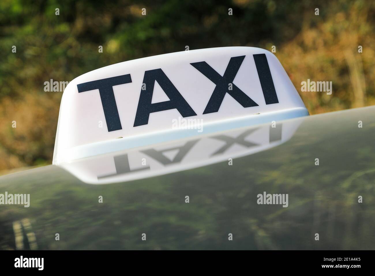 Uk taxi sign hi-res stock photography and images - Alamy