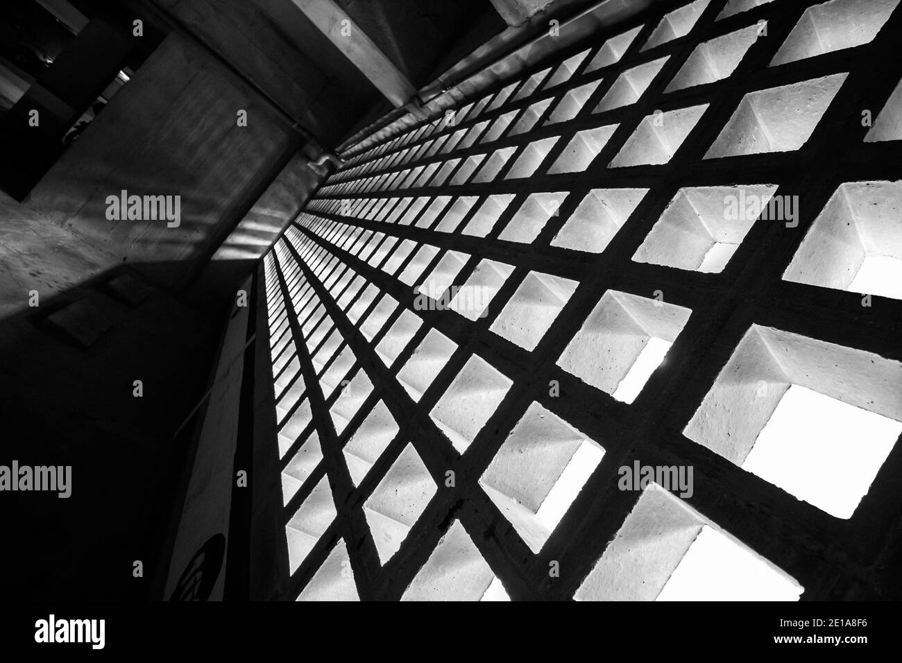 A perspective view of an array of tiny windows with an intense ...