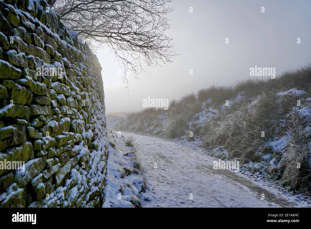 Dry stone wall in the snow Stock Photo - Alamy