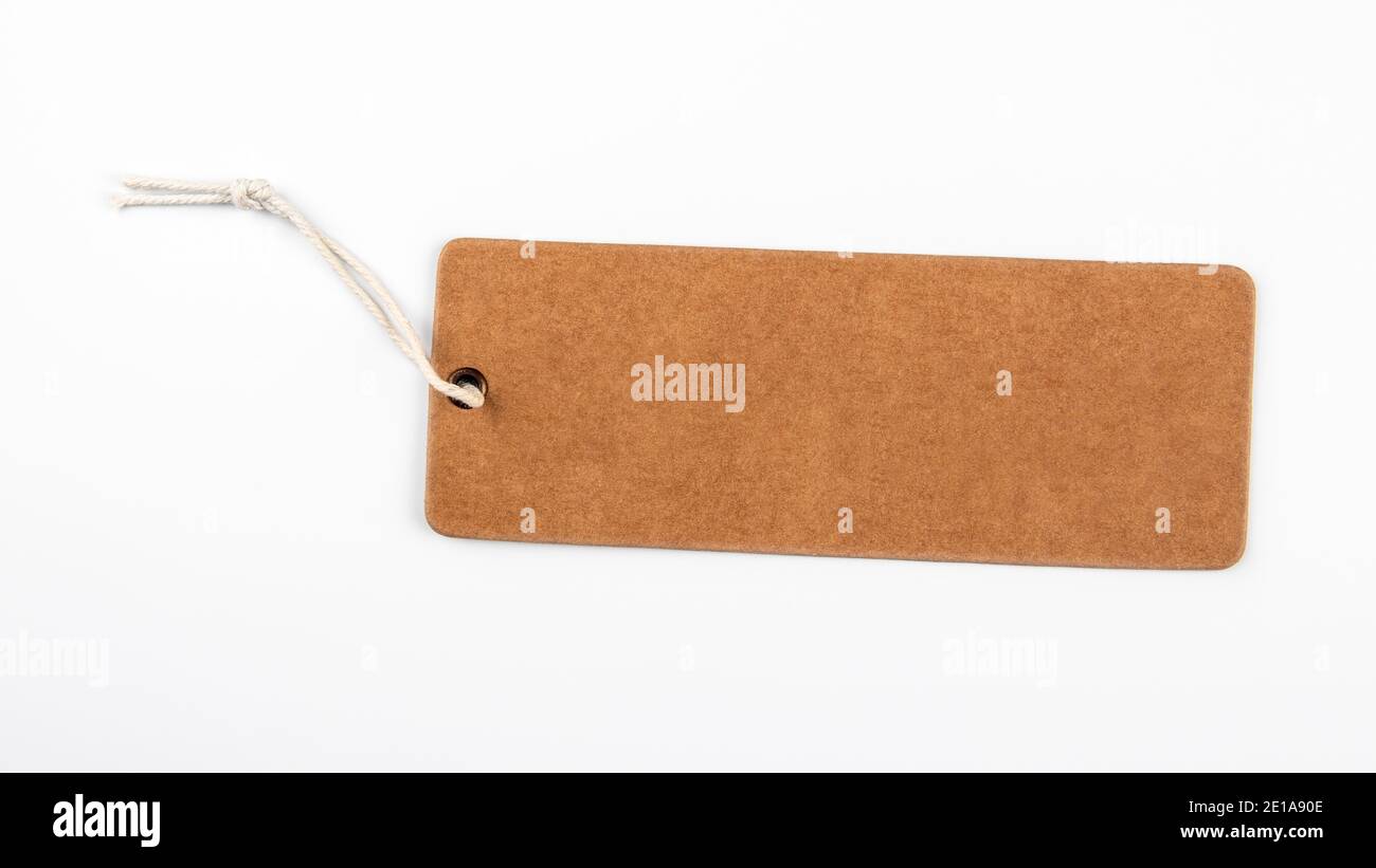 Cardboard price tag with string on a white background Stock Photo - Alamy