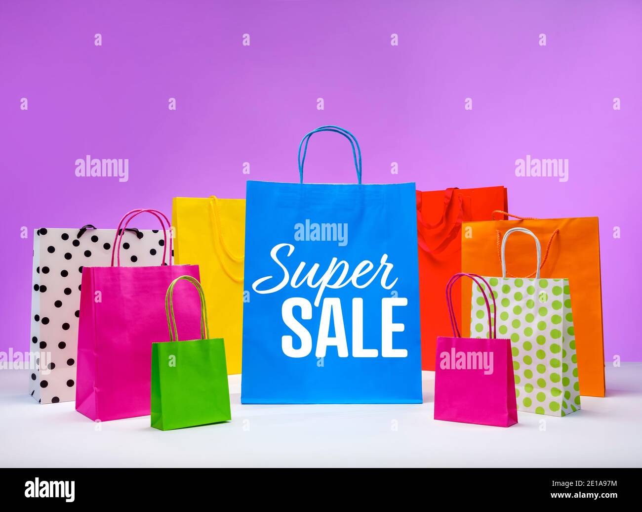 Colorful paper bags for shopping and gifts Stock Photo - Alamy