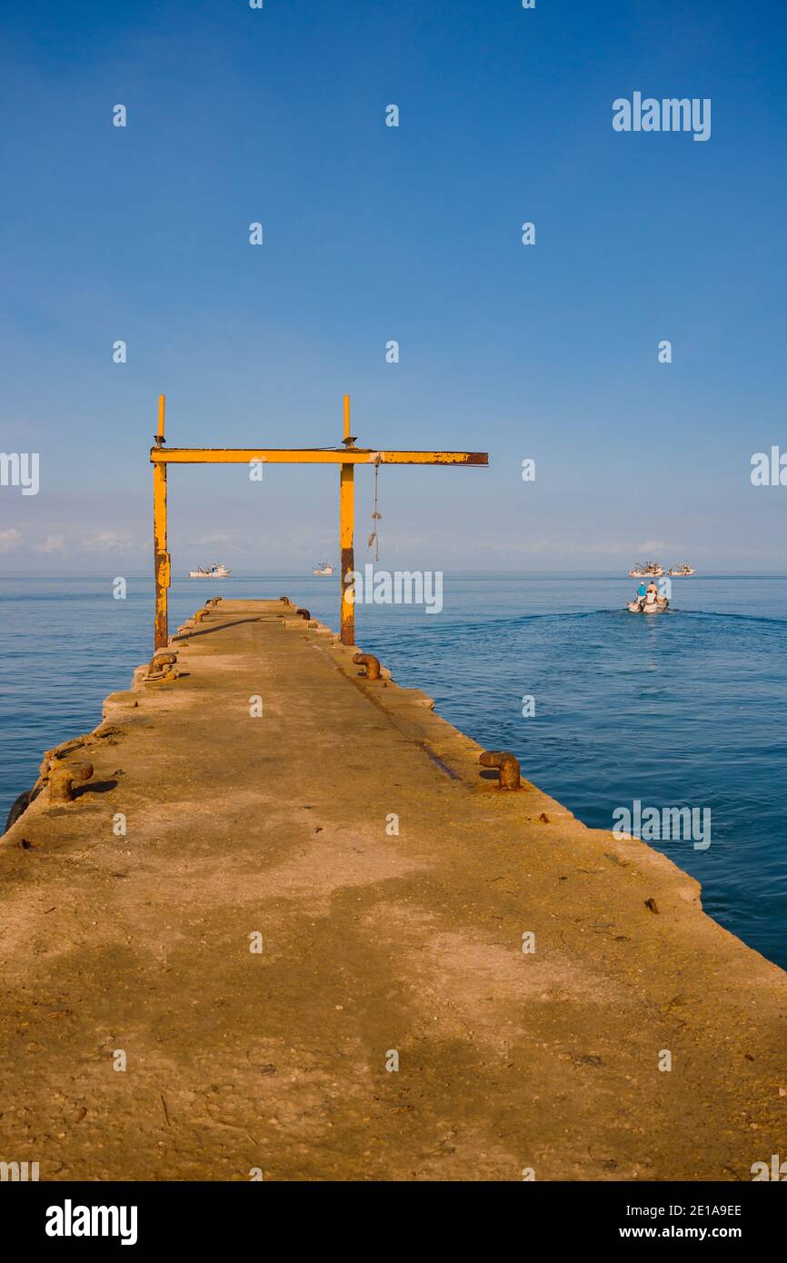 Fishing boats near its docking places, some of them are parked and tied ...