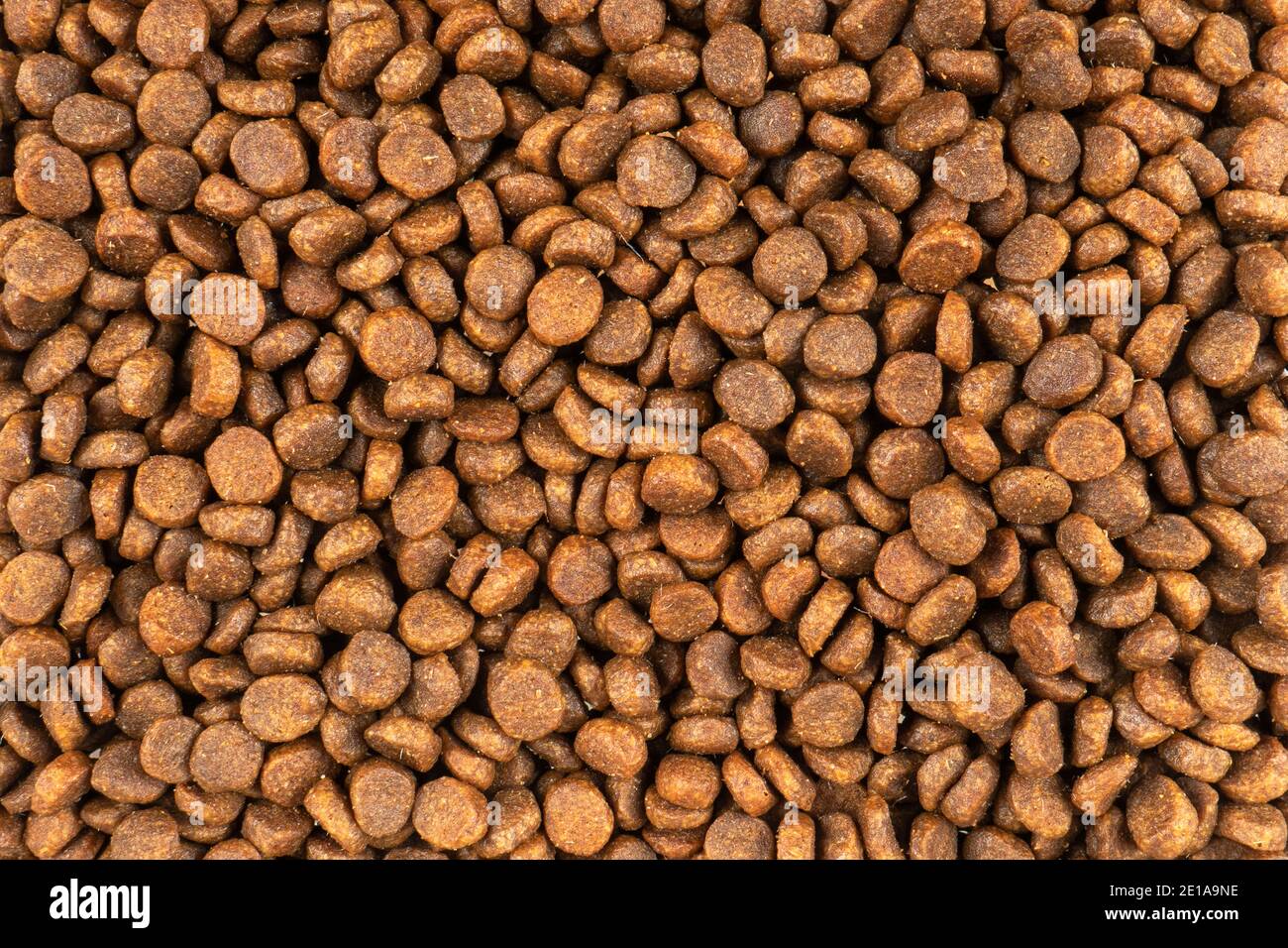 Dry pet food texture background. Food for cats and dogs pattern. Pile ...