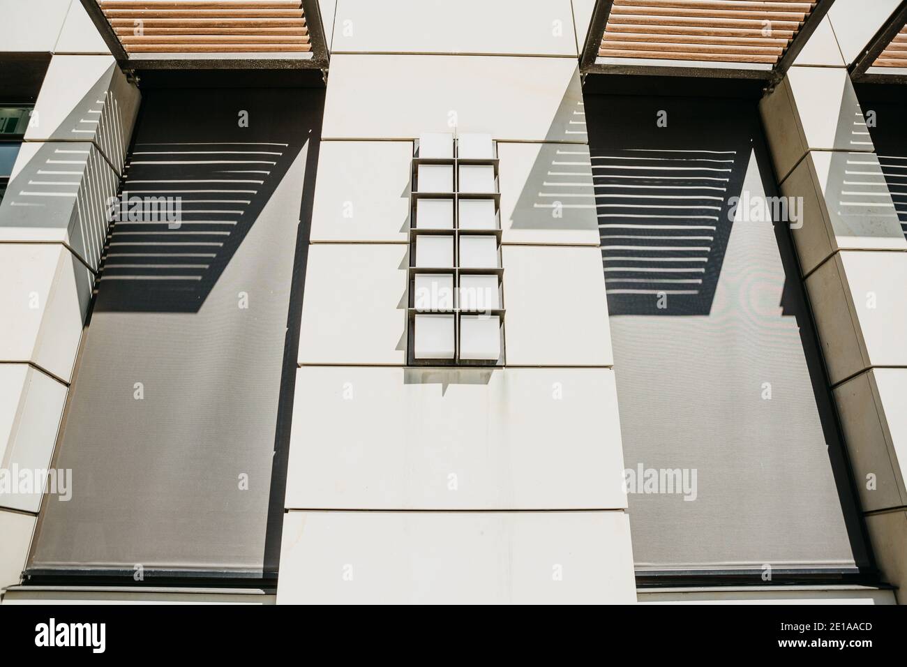 Symmetrical closed windows and wall close-up of building exterior Stock ...