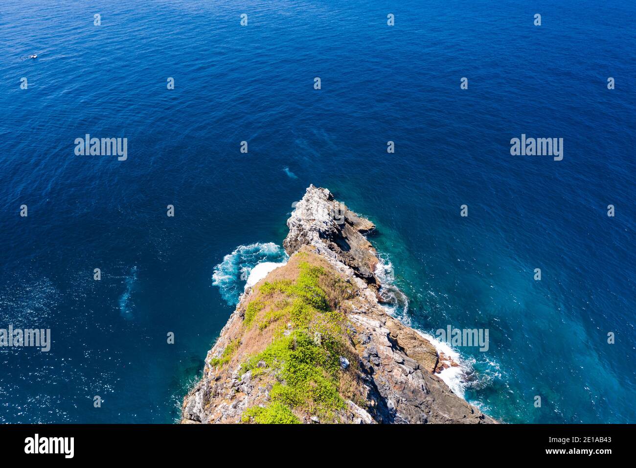 Aerial drone view of SCUBA divers on a coral reef off a beautiful ...