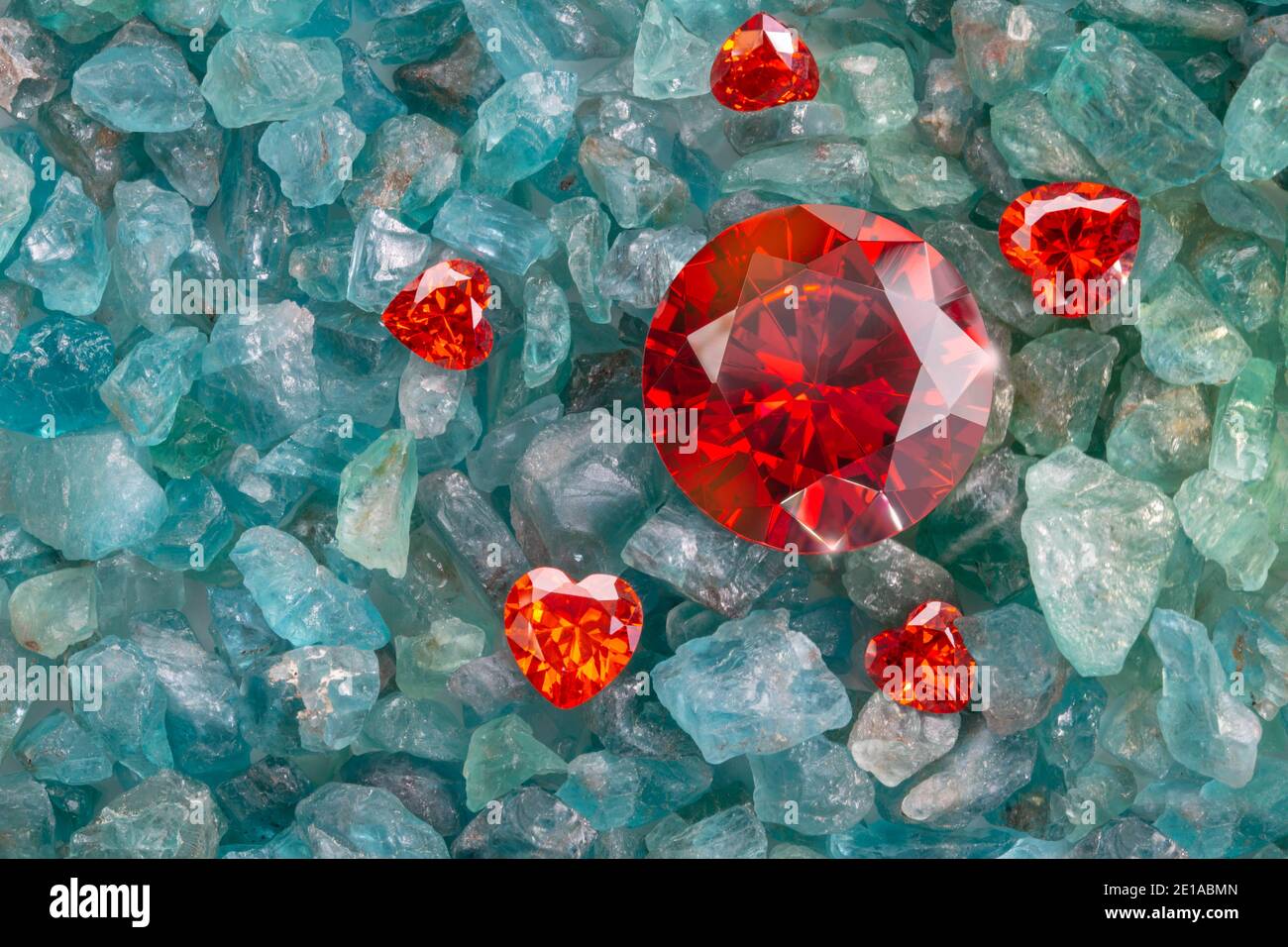 heart shaped ruby red diamond on raw Ruby Gemstone on raw sky blue ...