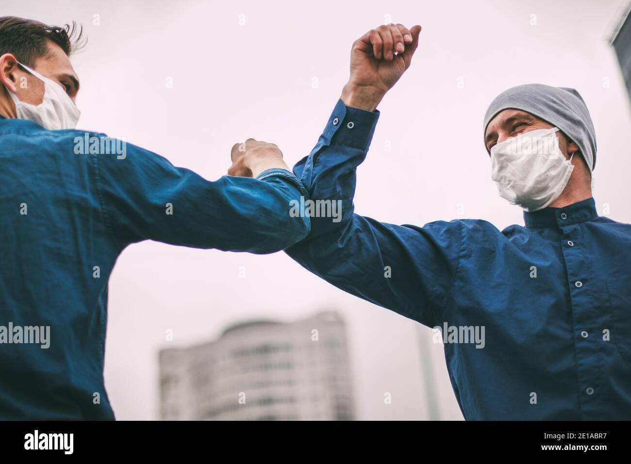 Shake hand elbow hi-res stock photography and images - Alamy