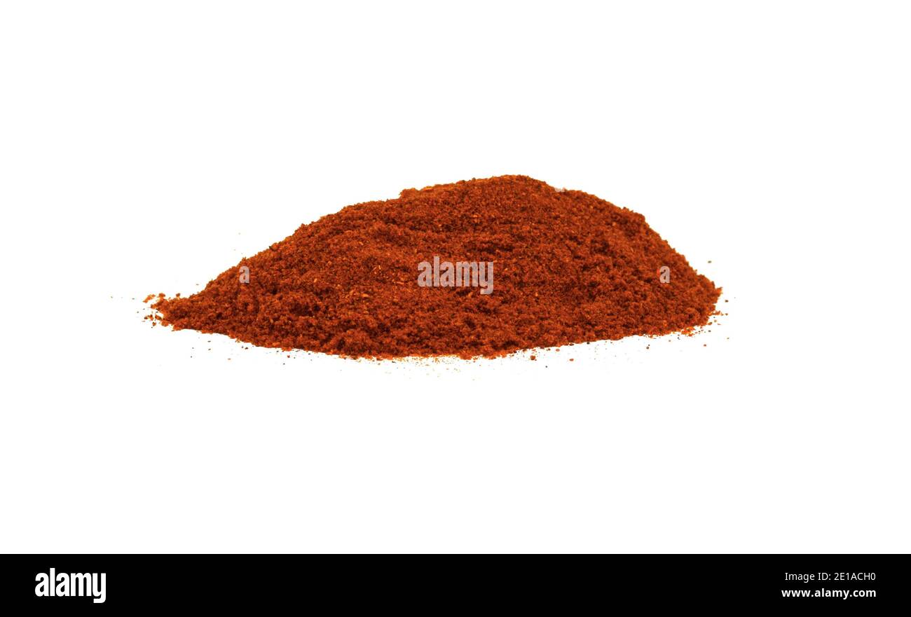 Cayenne pepper spice isolated on a white background cutout. Pile of red ...