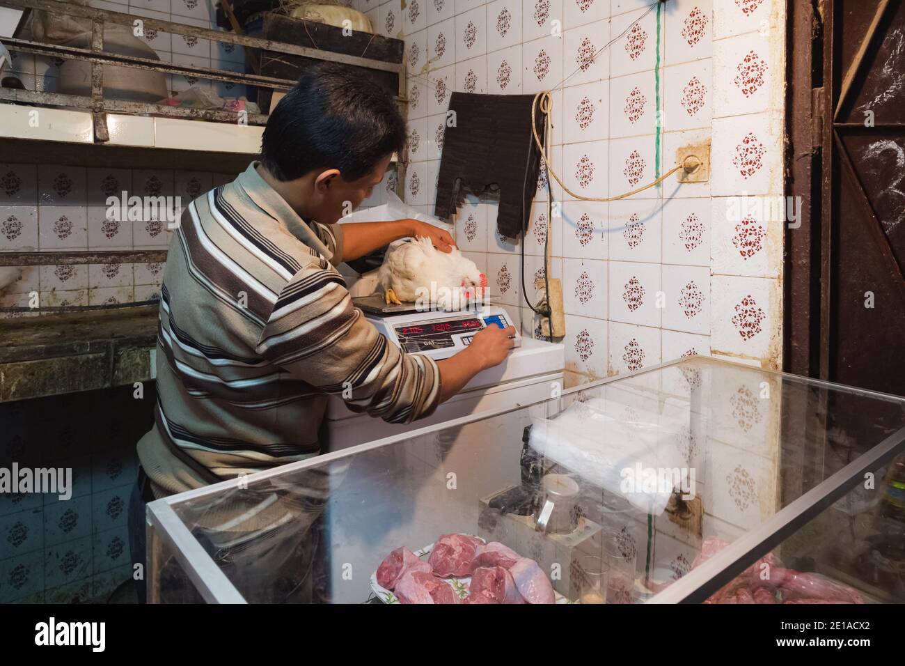Fez, Morocco - November 27 2015: A street butcher at a market in the ...