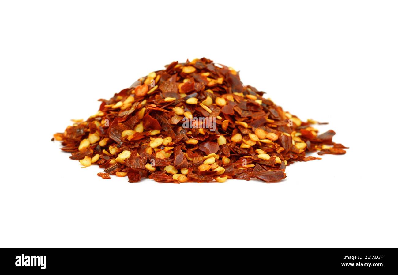 Cayenne pepper. Pile crushed red cayenne pepper, dried chili flakes and ...