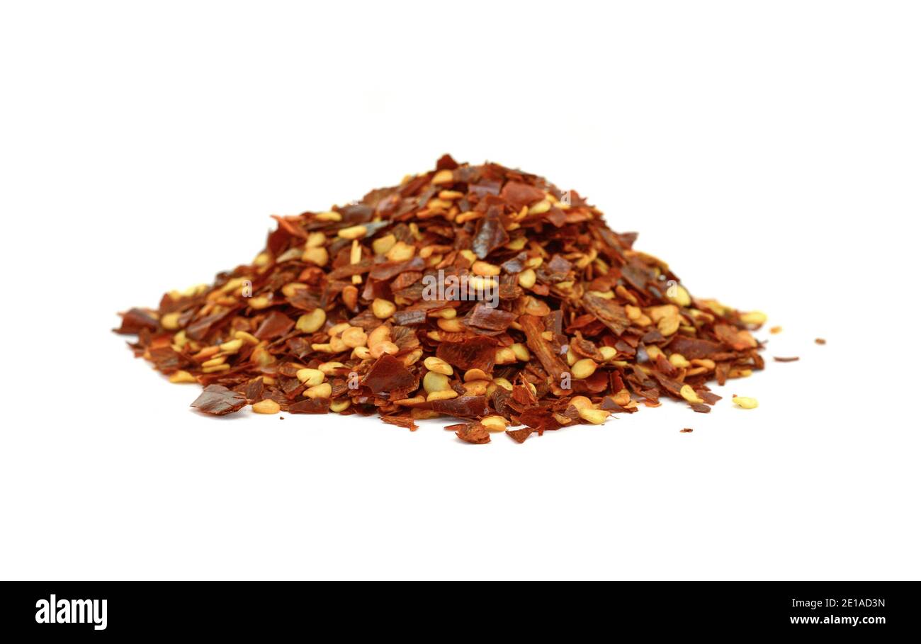 Cayenne pepper. Pile crushed red cayenne pepper, dried chili flakes and ...