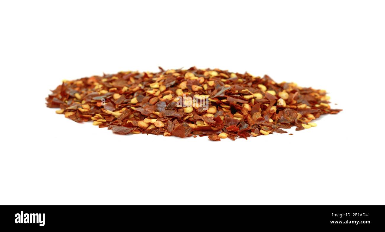 Cayenne pepper. Pile crushed red cayenne pepper, dried chili flakes and ...