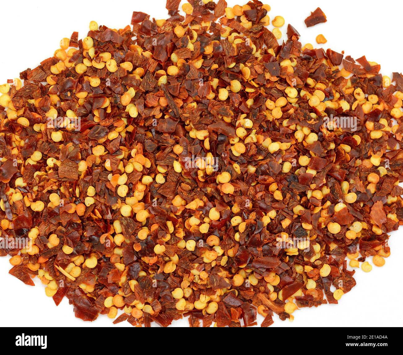 Cayenne pepper. Pile crushed red cayenne pepper, dried chili flakes and ...