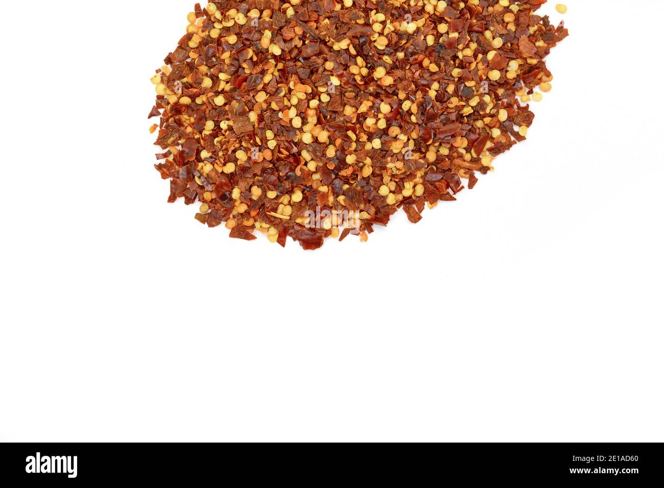 Cayenne pepper. Pile crushed red cayenne pepper, dried chili flakes and ...