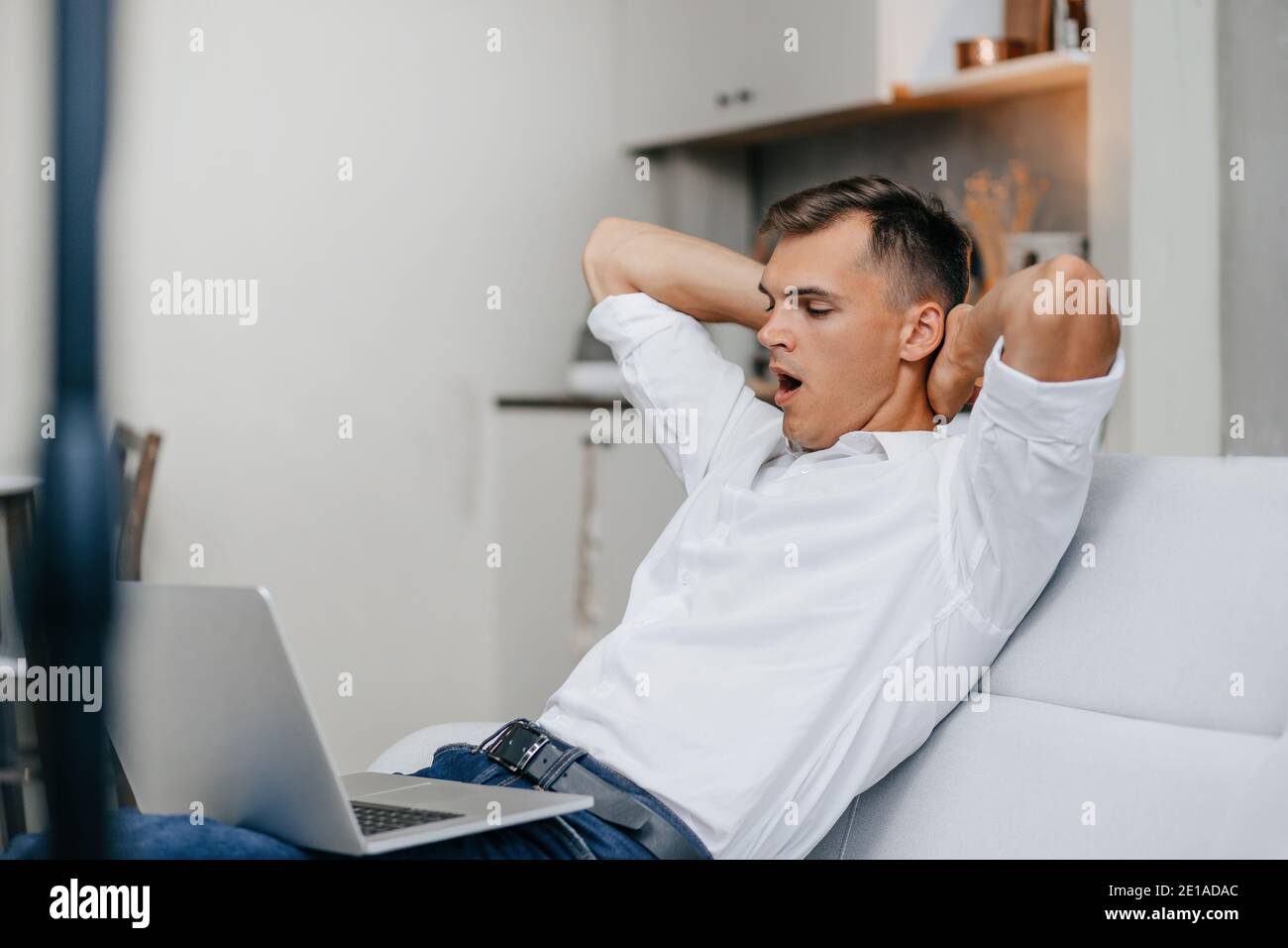 Man illuminated by screen sofa hi-res stock photography and images - Alamy